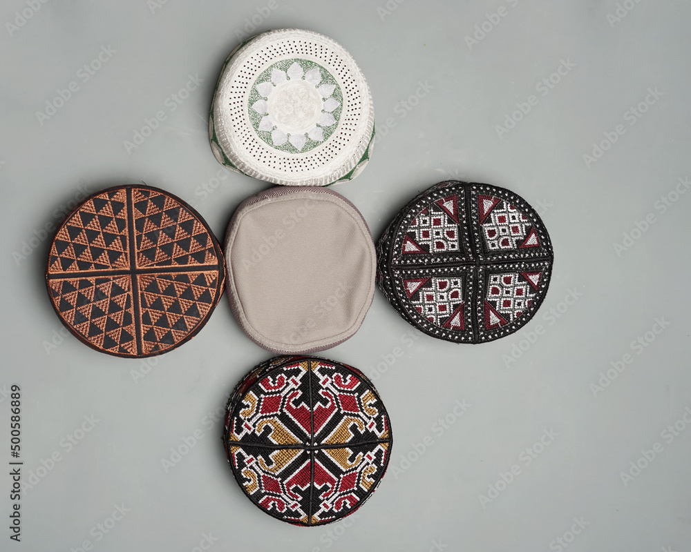 Collection of kopiah hat or peci with a variety of color and shape ...