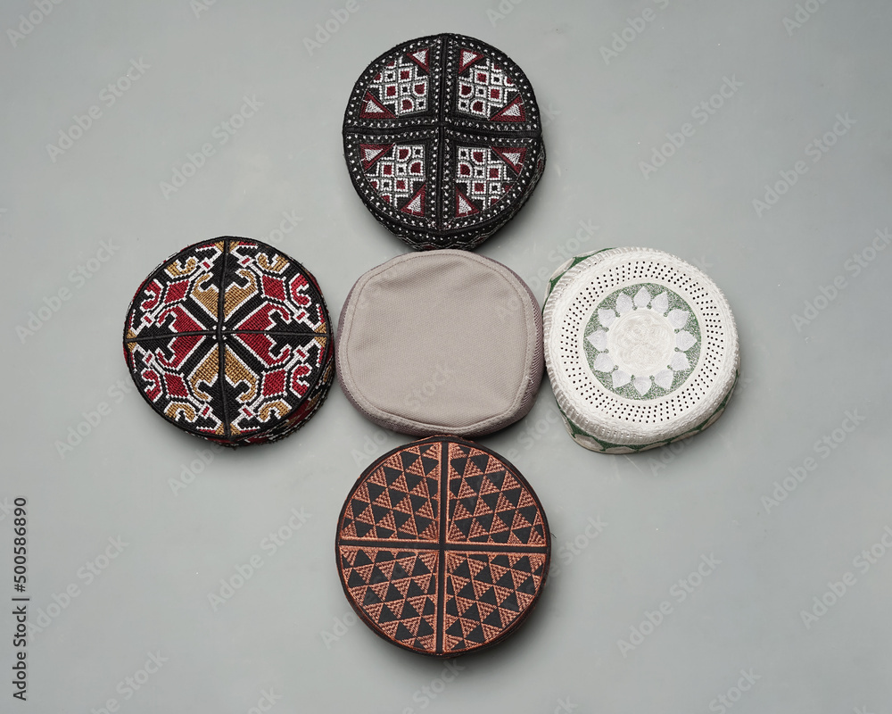 Collection of kopiah hat or peci with a variety of color and shape ...