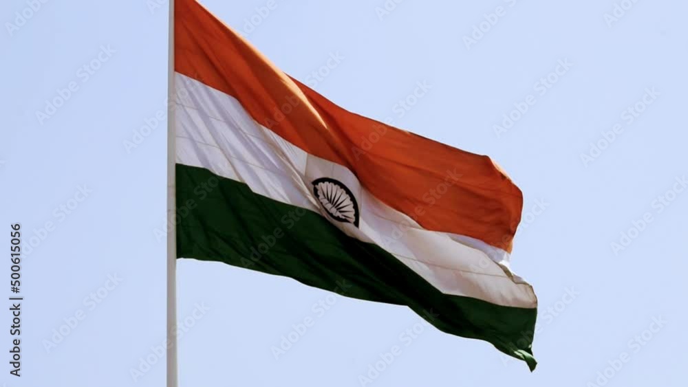 India flag flying high with pride in blue sky, India flag fluttering ...