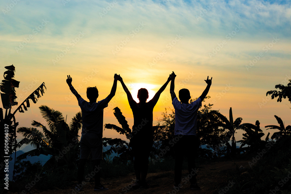 Tres personas a contraluz selva peruana Stock Photo | Adobe Stock