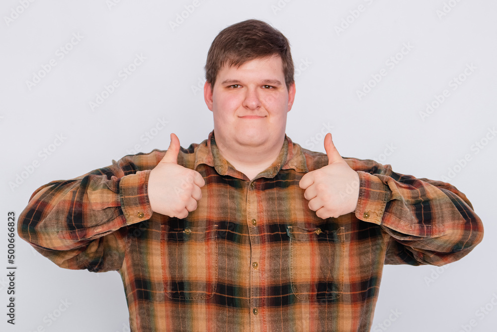 Fat guy showing thumbs up with both hands isolated on white background ...
