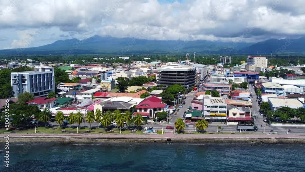 An aerial shot of Dumaguete City streets and the boulevard (capital of ...