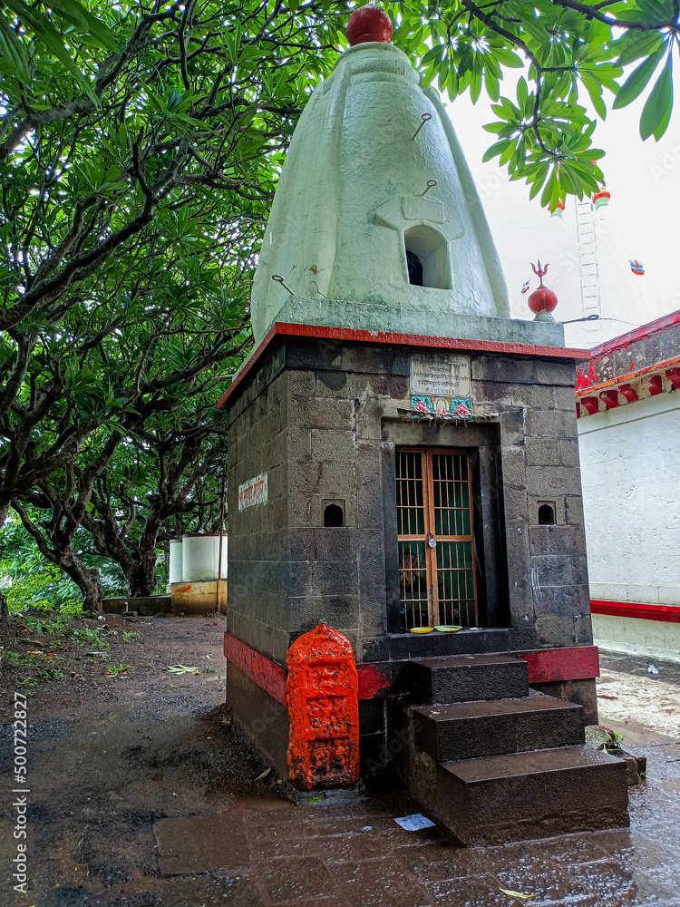 Stock photo of an old hindu temple made up of gray stones,roof top of ...