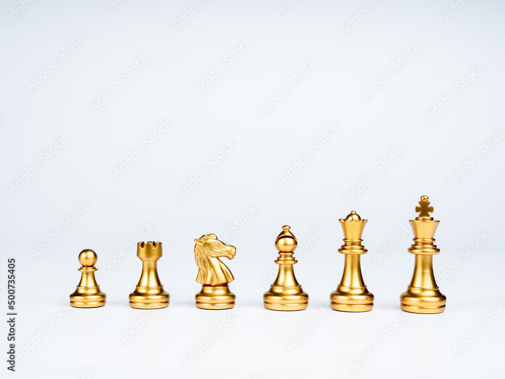 Set of luxury golden chess pieces isolated on white background. The ...