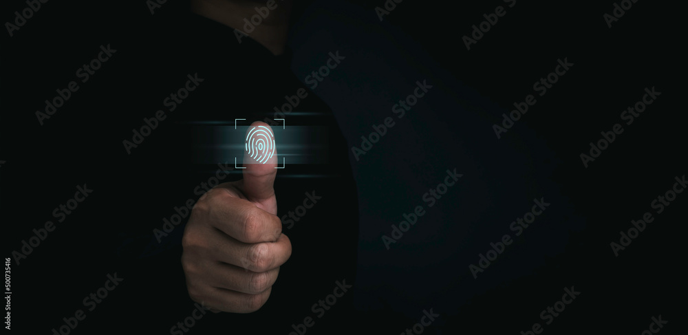 A fingerprint icon appeared while human thumb scanned for security ...