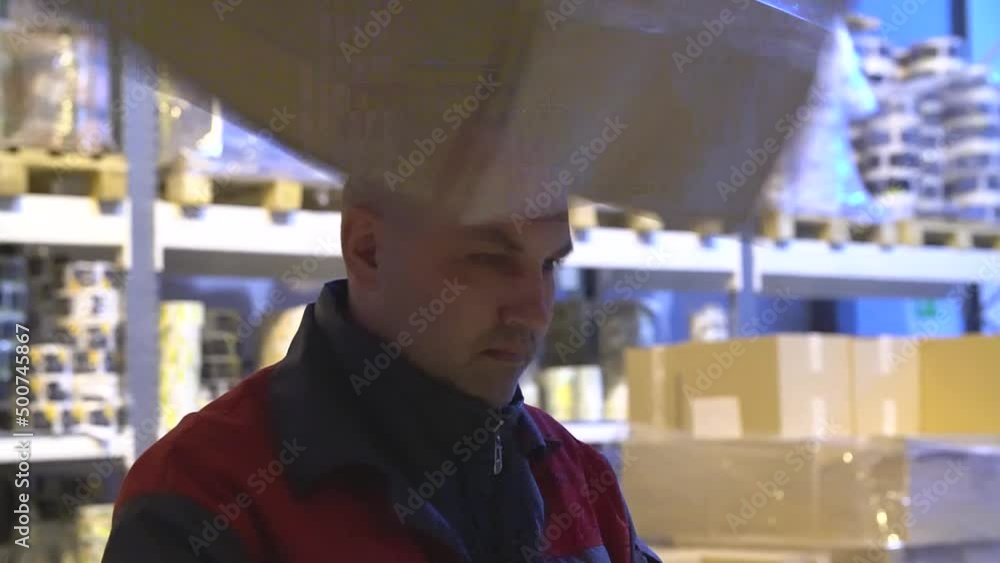 Vídeo do Stock: Injury at work. Warehouse worker lying unconscious on ...