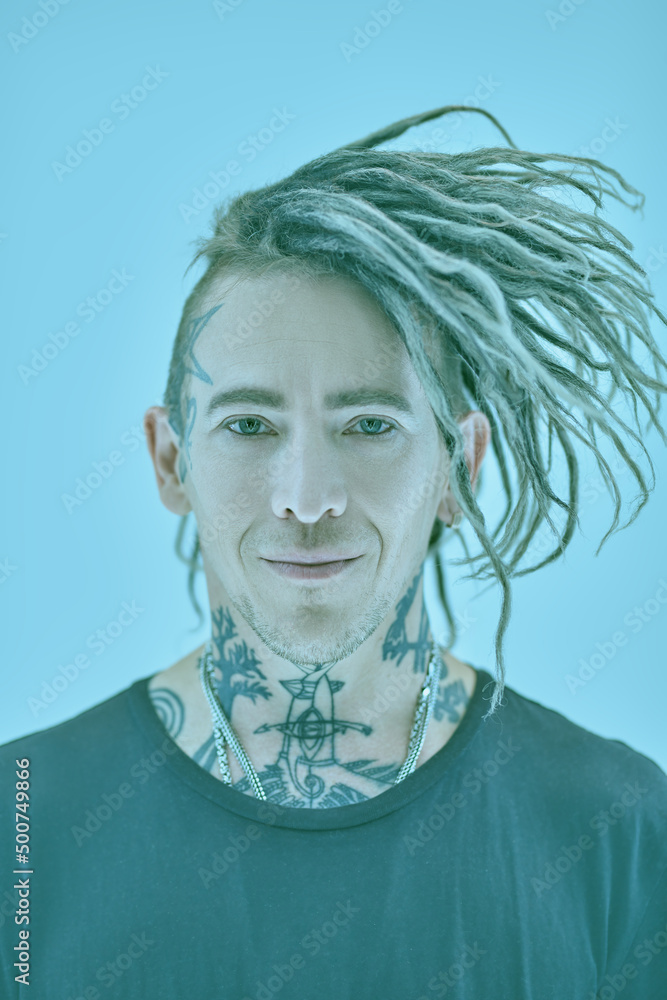 rocker with dreadlocks Stock Photo | Adobe Stock