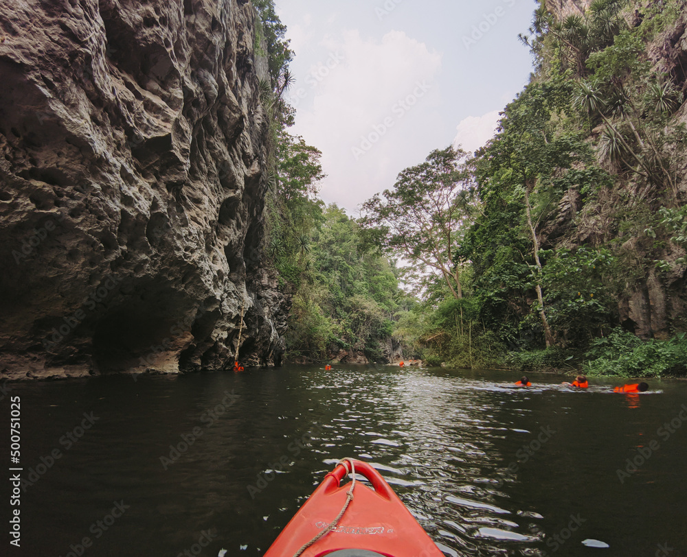Amazing Nature landscape view of kayaking on the river flowing through ...