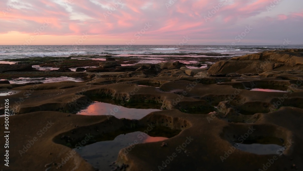 Eroded rock formation, tide pool shape in La Jolla, California coast ...
