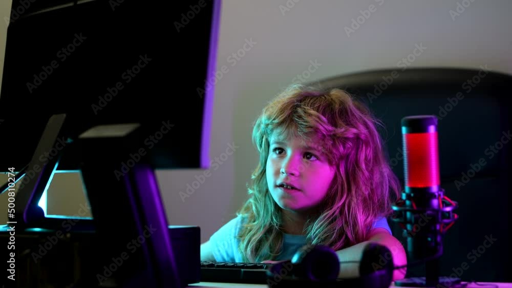 Little boy at the pc computer screen. Cute preschool kid is watching ...