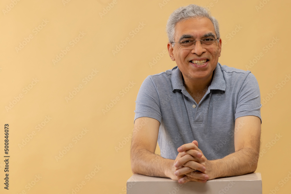 Portrait of a happy senior man looking at camera and smiling Stock ...