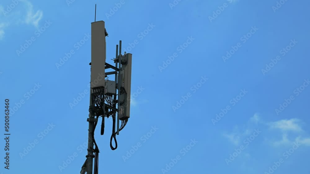 4k Time lapse of Cell tower antennas transmitting data, repeaters for mobile communications and ...