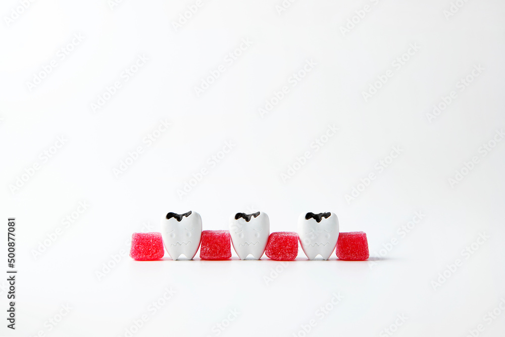 Decay and cavities teeth between sweet sugar red jelly instead of gum ...