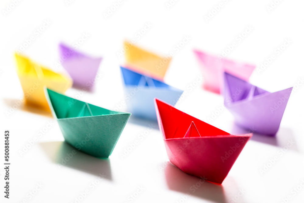 Paper boats leadership, teamwork and winning success Stock Photo ...