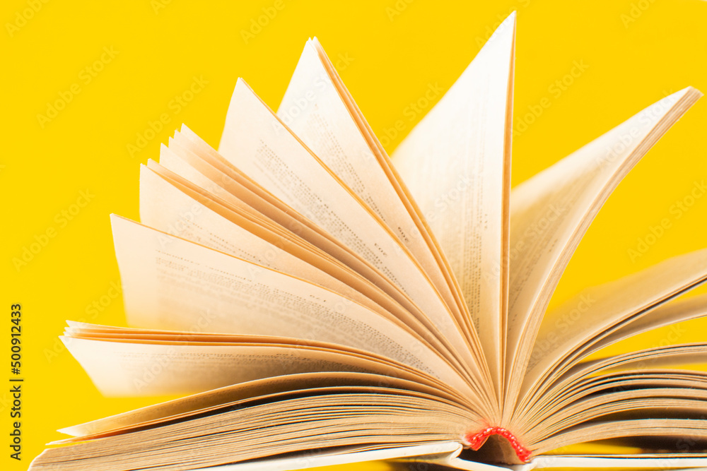 a stack of books and an open book. Books background for science and ...