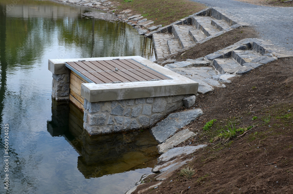 pond sluice, water reservoirs with regulation and concrete dam shaft ...
