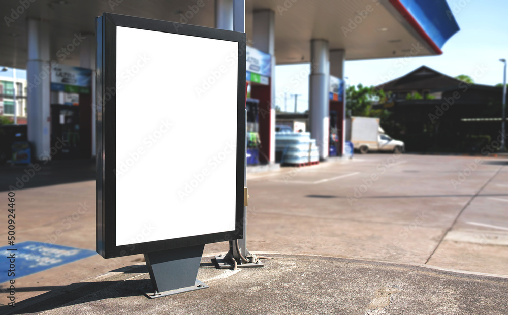 Large white blank billboard mockup displayed inside the gas station ...