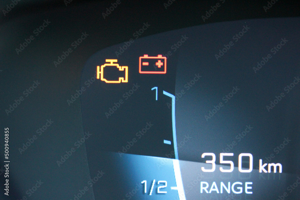 Various warning signs and fuel display in a digital gauge cluster Stock ...