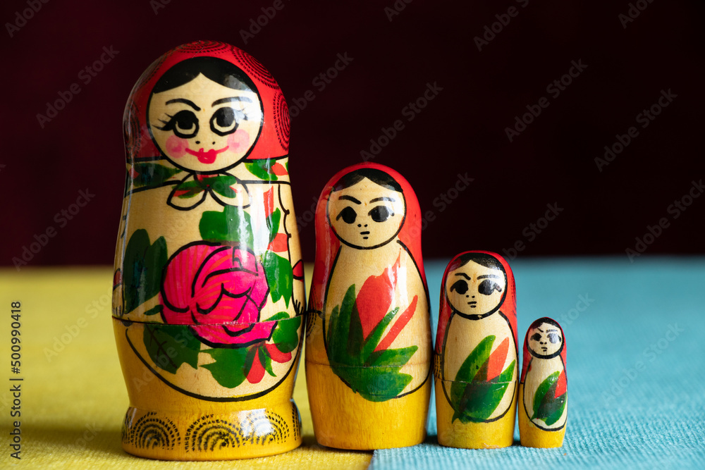 Russian nesting dolls Stand on the flag of Ukraine, Russian Ukrainian ...