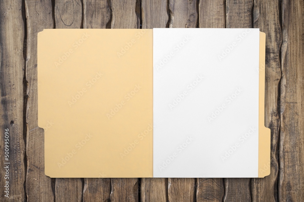 Paper file with documents on wooden table, top view. Space for text ...