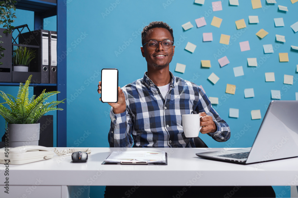 Project manager pointing phone device with mockup display to camera ...