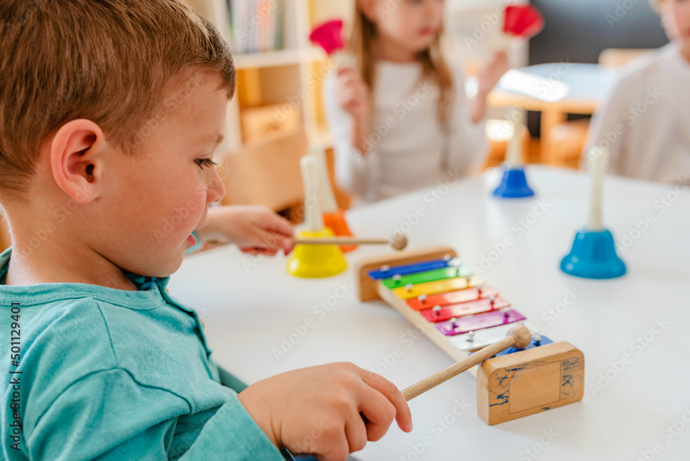Kindergarten Children Learning Music Using Various Colorful Instruments ...