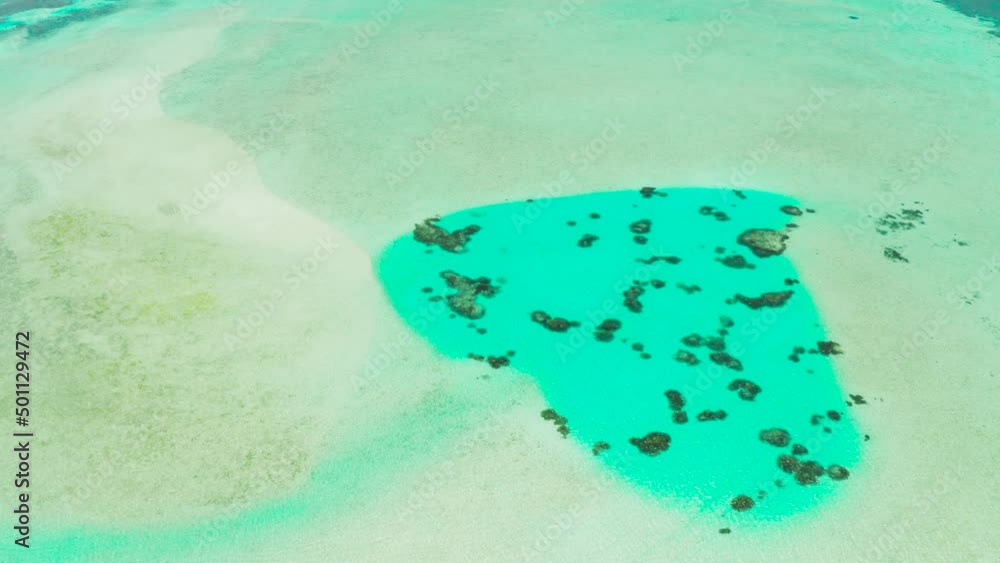 Sandy beach with and azure water of the lagoon,copy space for text, top ...