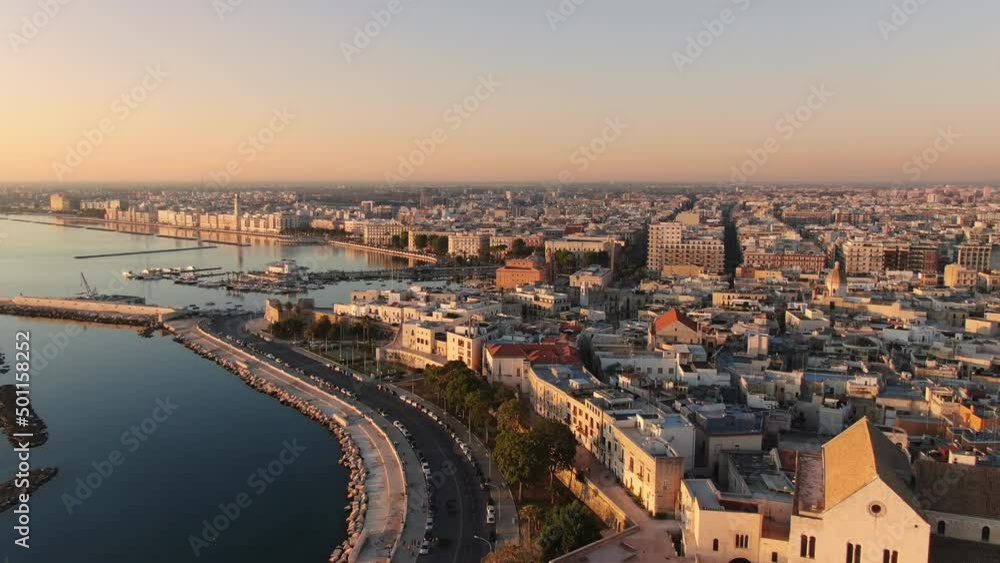 bari aerial shot drone fly over city center seafront at sunrise,wide ...