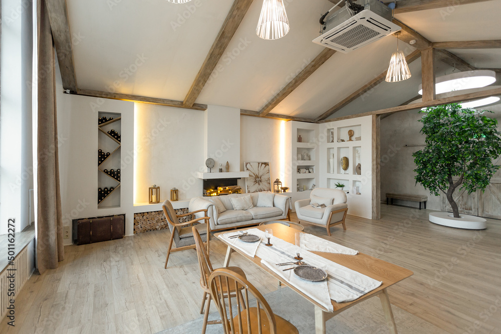 cozy warm home interior of a chic country house with an open plan, wood ...