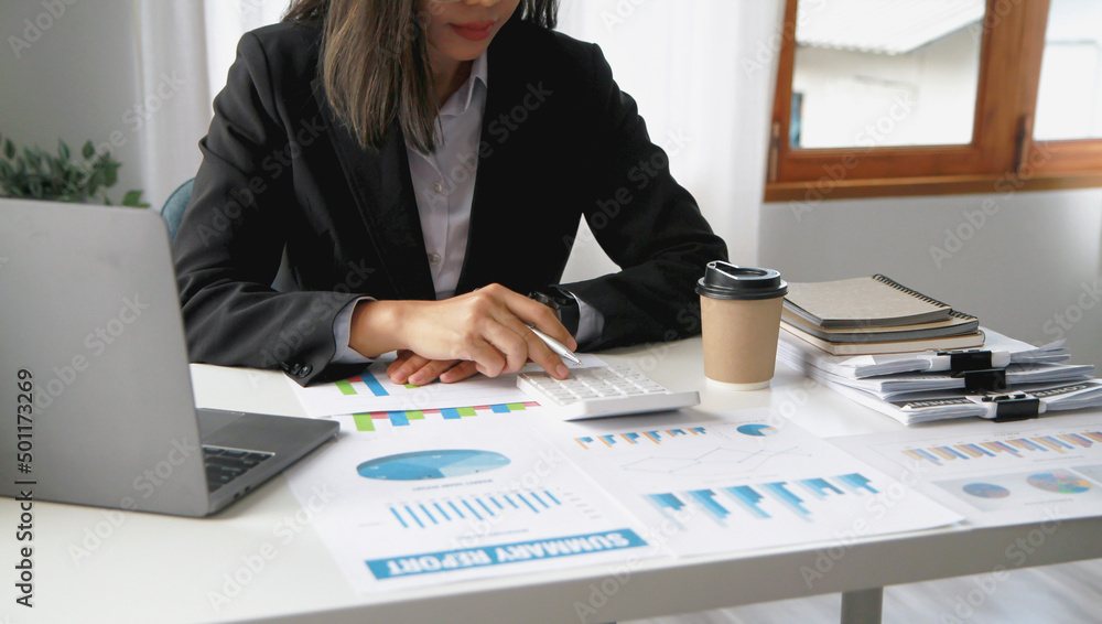 Financial advisor calculating numbers datasheets graphs charts reports ...