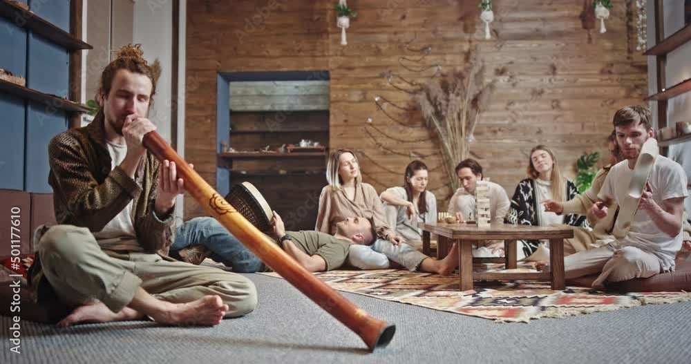 Hippies playing traditional musical instruments together. Group of ...