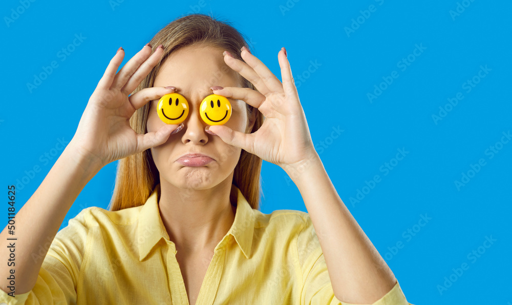 Not OK. Girl hides real emotions behind two fake smiley yellow emojis ...