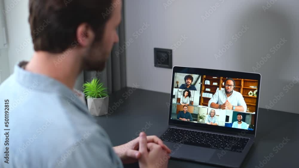Caucasian freelancer man waving hello into laptop webcam, guy connected ...