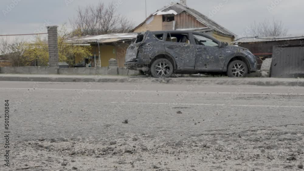 Aftermath shell of civilian bombed city damage car shooting bullet ...