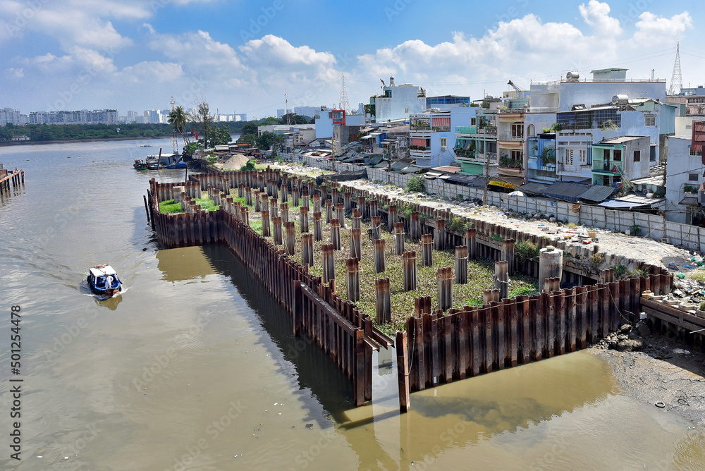 Large construction in the river for urban flood prevention. Industry ...