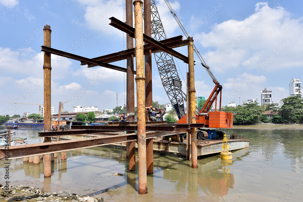 Large construction in the river for urban flood prevention. Industry ...