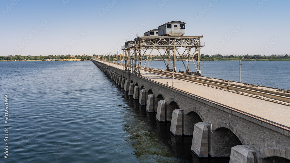 The bridge of the sluice system on the Nile in Esna. Metal ...