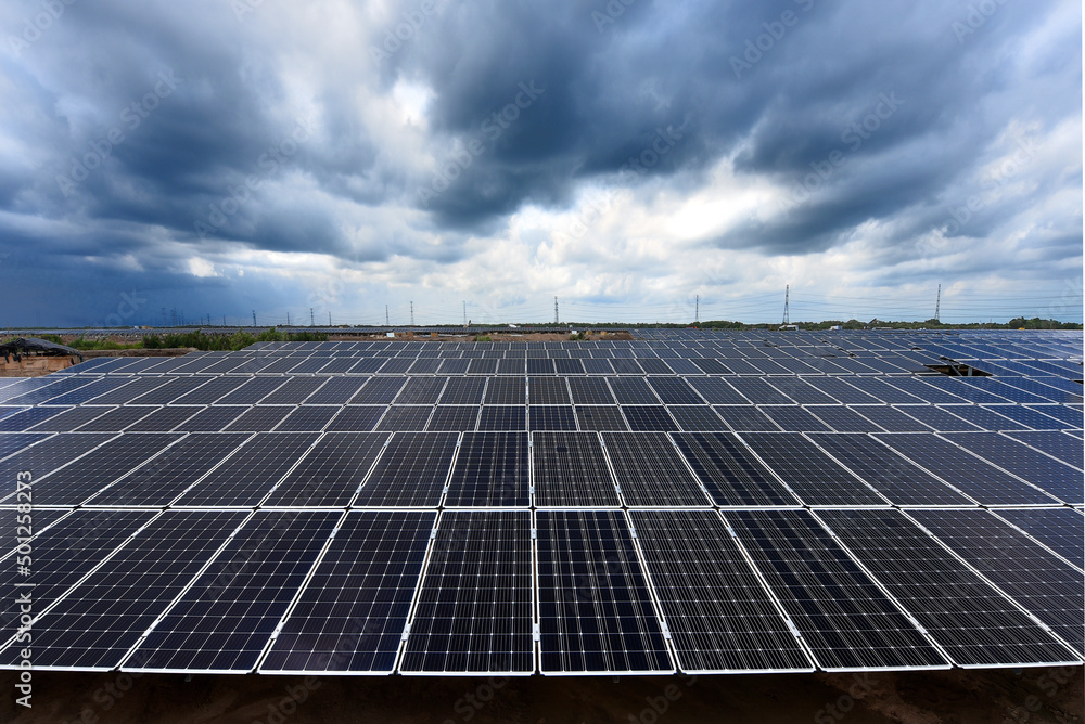 Photovoltaic modules solar power plant on dramatic sunset sky ...