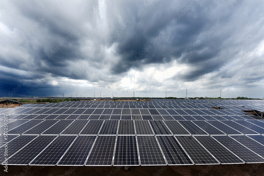 Photovoltaic modules solar power plant on dramatic sunset sky ...