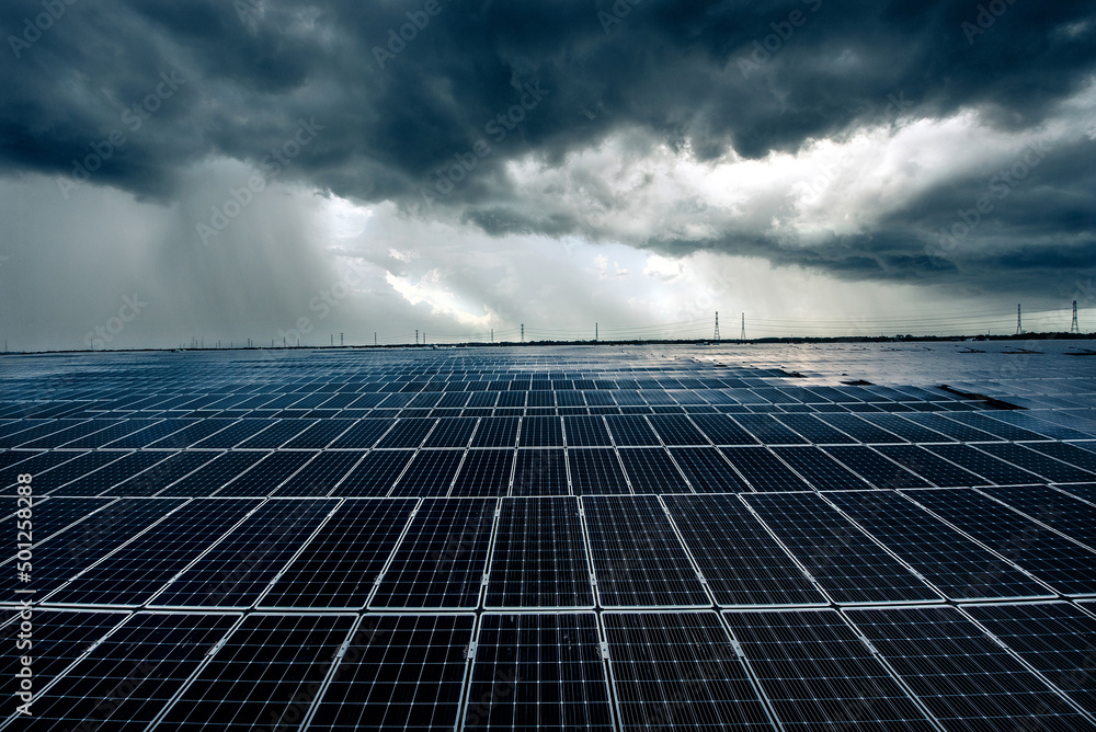 Photovoltaic modules solar power plant on dramatic sunset sky ...