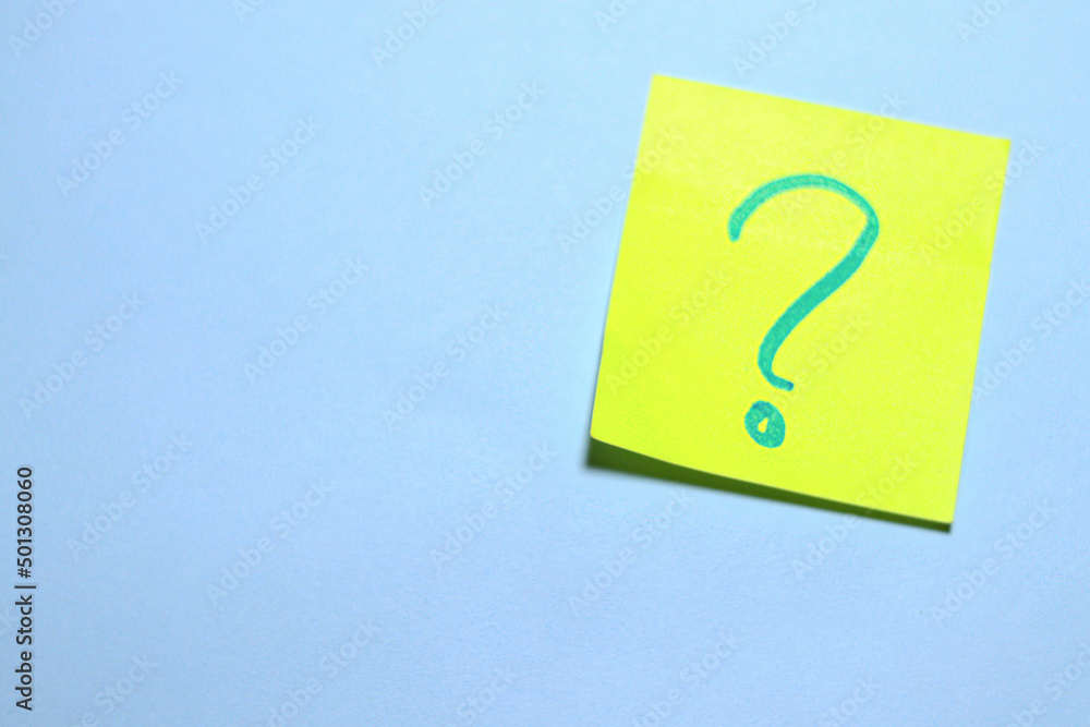 Question mark on a sticky note stuck on sky blue background. Stock ...