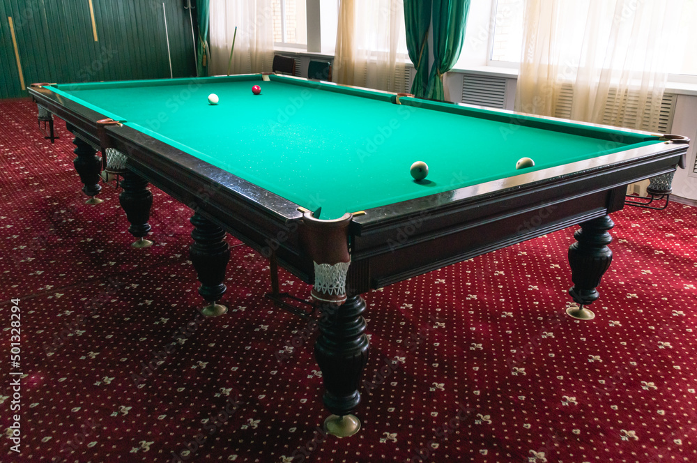 Billiard table with green cloth. Billiard room. Board game. Billiard ...