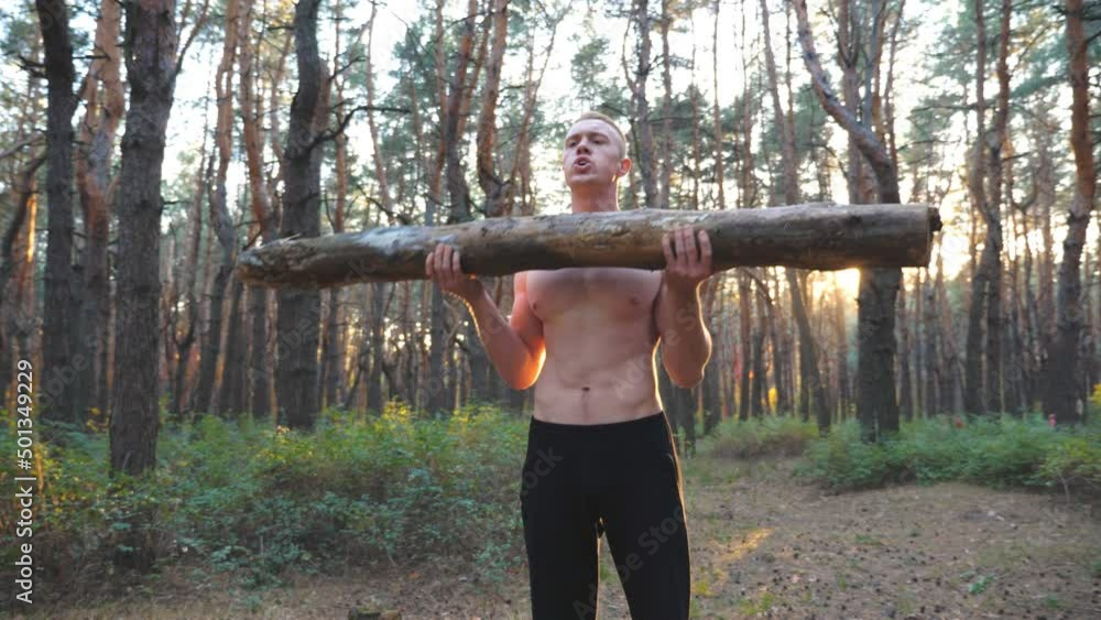 Muscular man lifting hard weight training biceps. Strong and hardy guy ...
