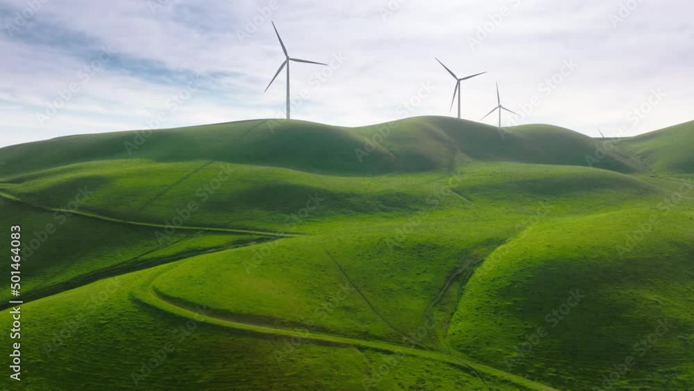 Windmills turbines generating electric power, epic aerial view ...