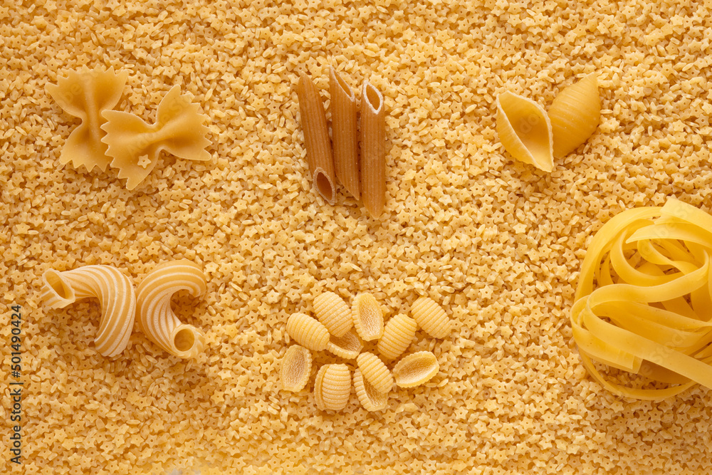 different shapes of pasta layout, italian pasta background Stock Photo ...