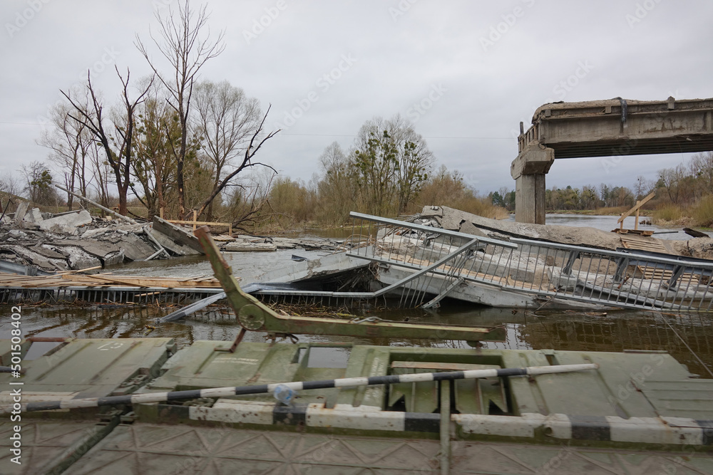 Damaged bridge. The civilian object was blown up. War in Ukraine ...