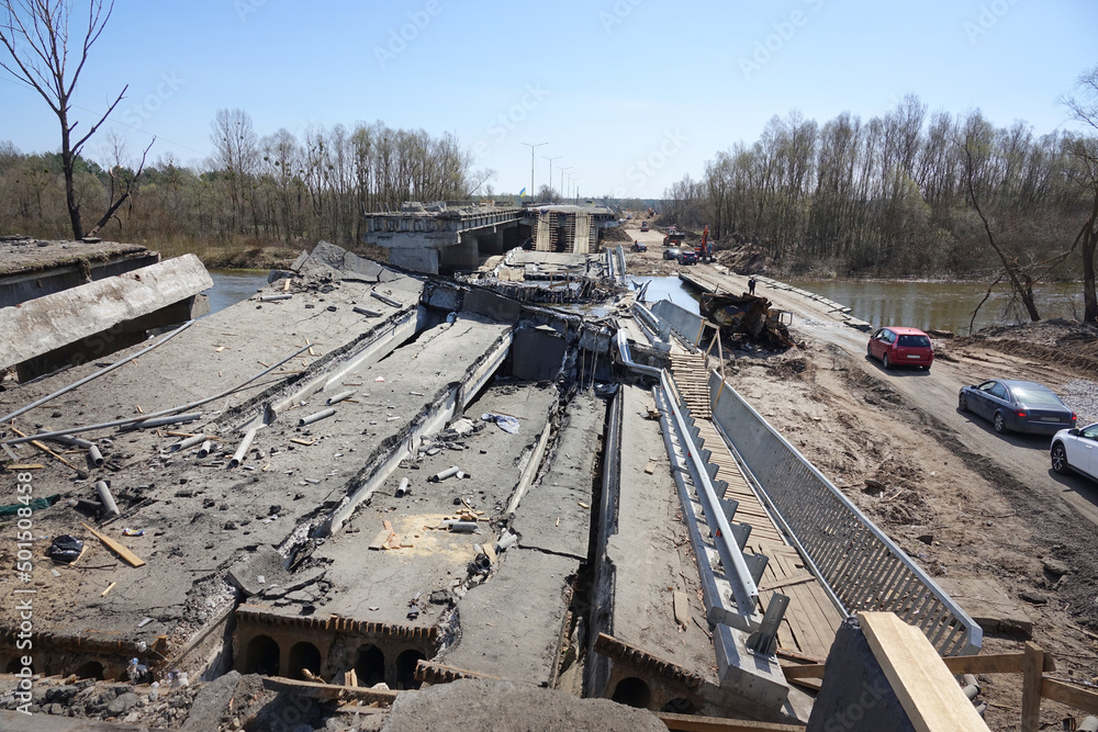 The blown up bridge over the river. Civil object damaged. Broken ...