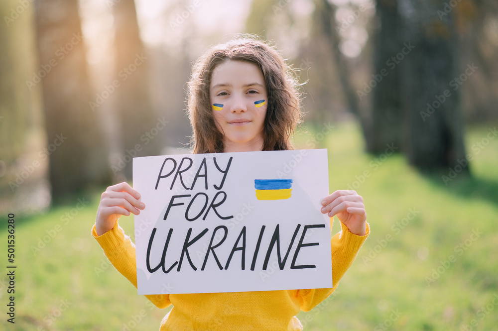 Close-up Ukrainian girl asks to pray for Ukraine. Concept is no war in ...