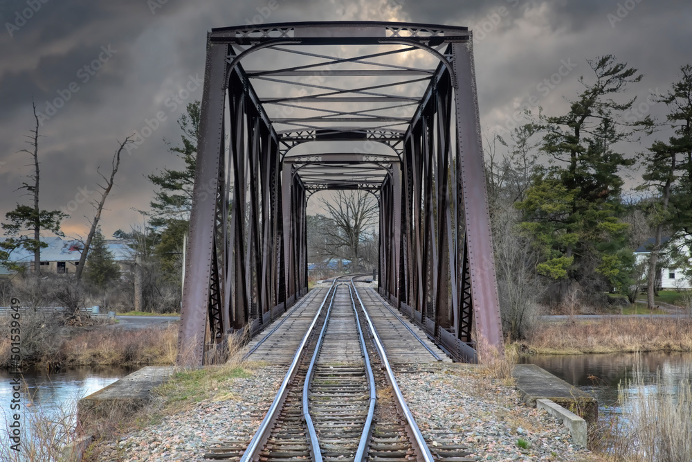 Old iron railway truss bridge built in 1893 crossing the Mississippi ...