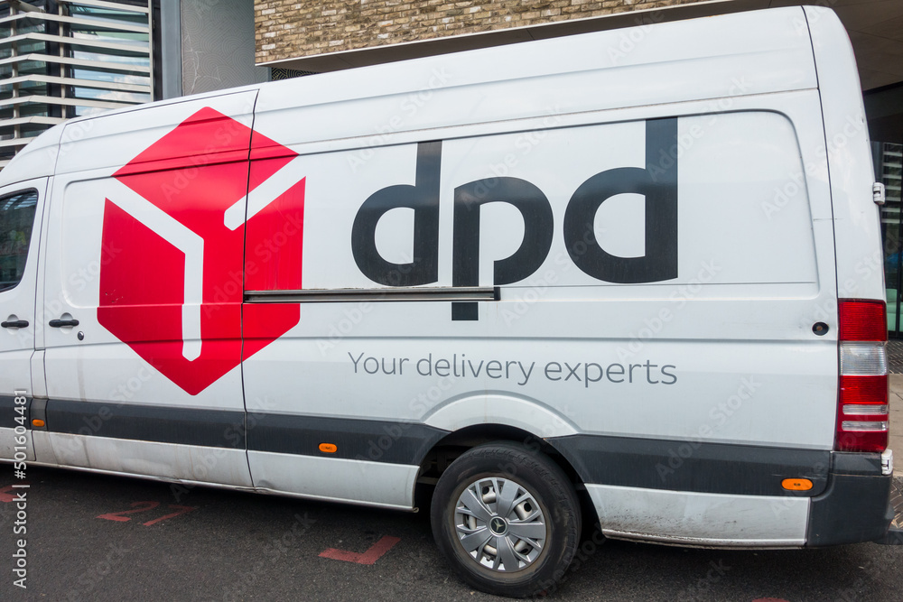 London, UK, March 20th 2022: A DPD white courier van and red logo sign ...